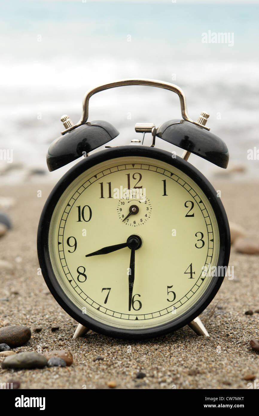 clock at the beach Stock Photo - Alamy