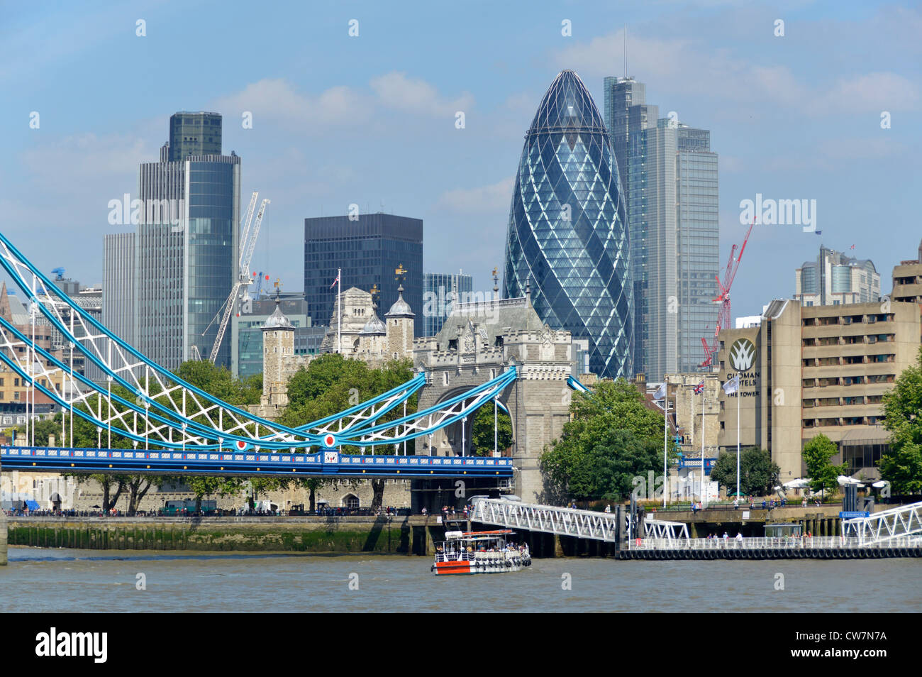 London skyline beyond Tower Bridge approaches including the Gherkin ...