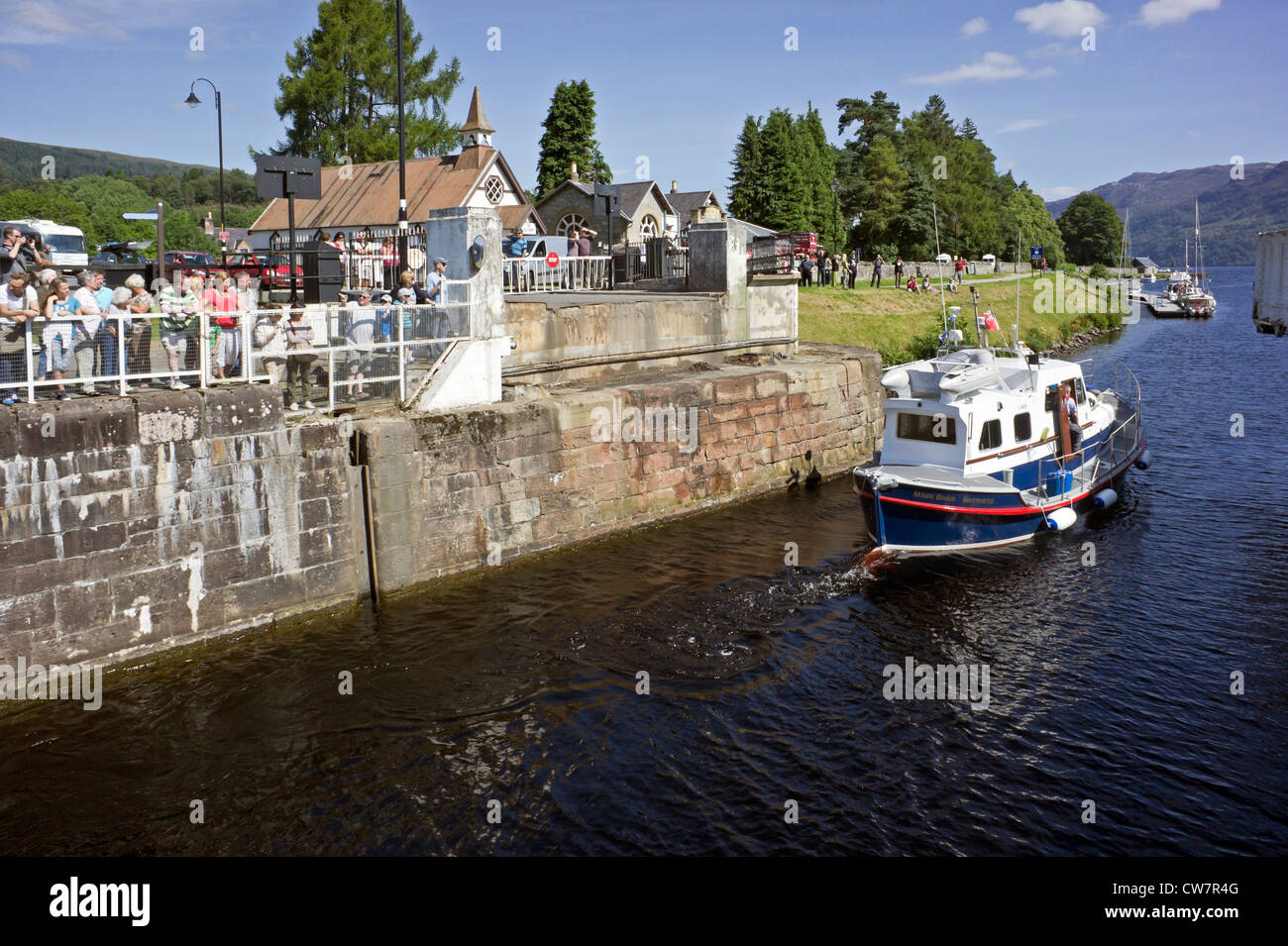 Motor vessel leaving the last lock and passing open road bridge in ...