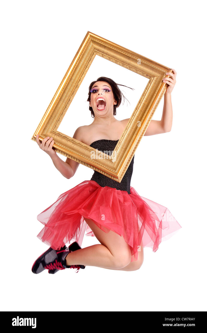Beautiful girl jumping with frame isolated in white Stock Photo - Alamy