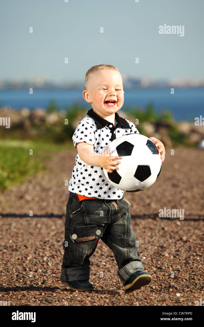 Football boy child kid infant hi-res stock photography and images - Alamy