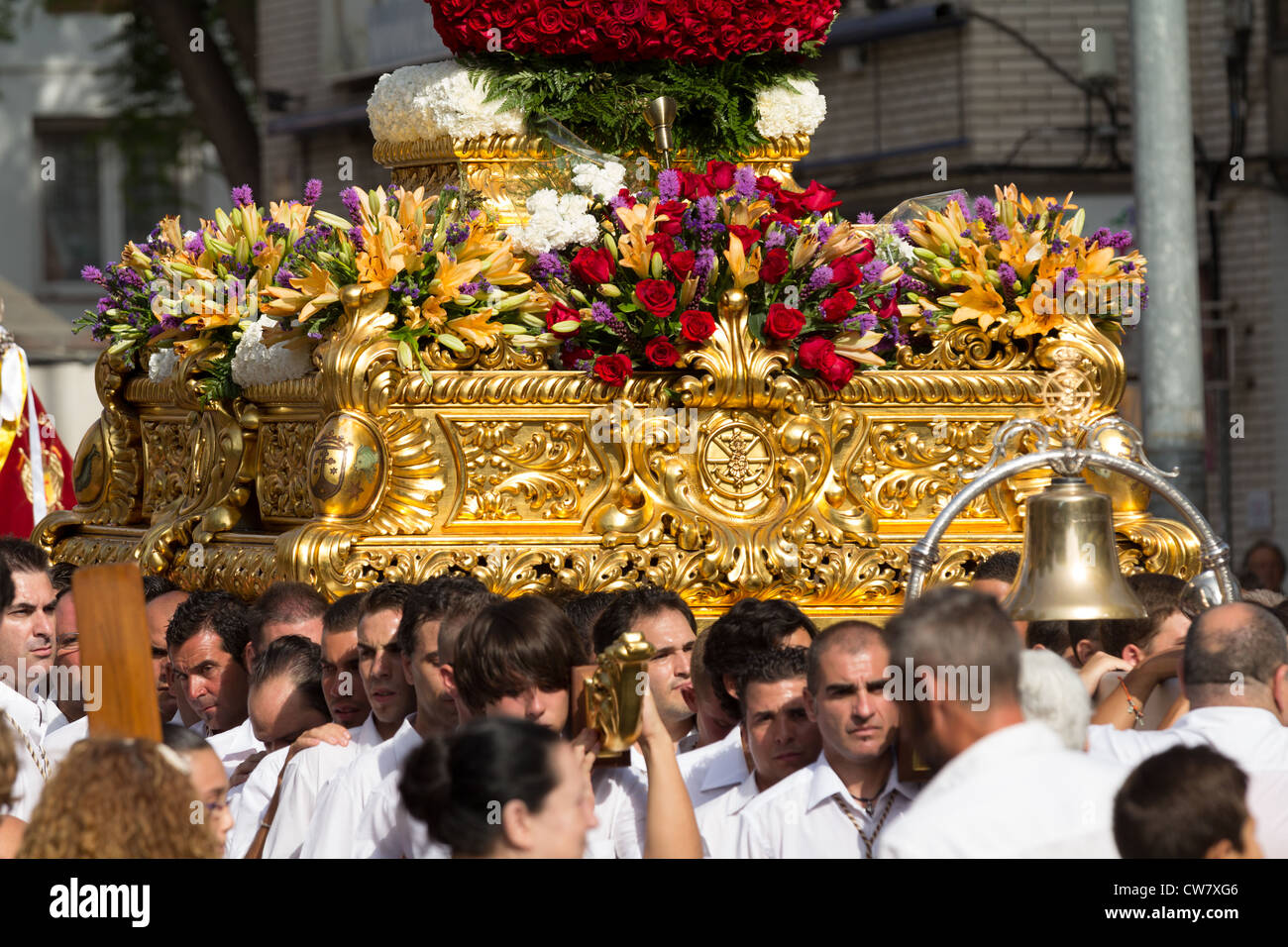 Worshipers carrying a religious image in a procession Stock Photo - Alamy