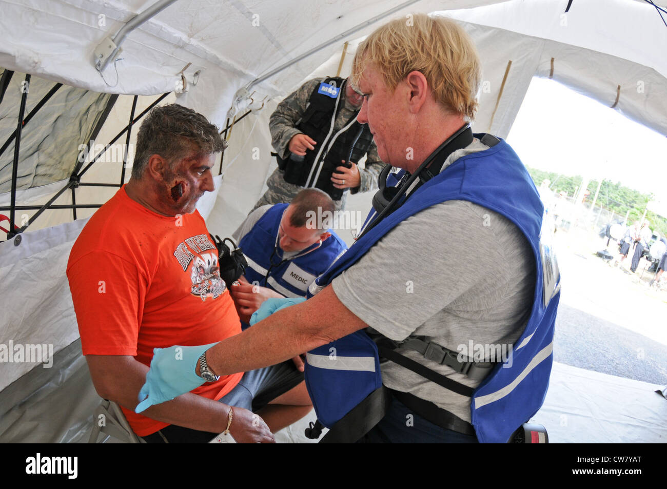Col. Maureen McCarthy, 102nd Medical Group commander, evaluates a ...