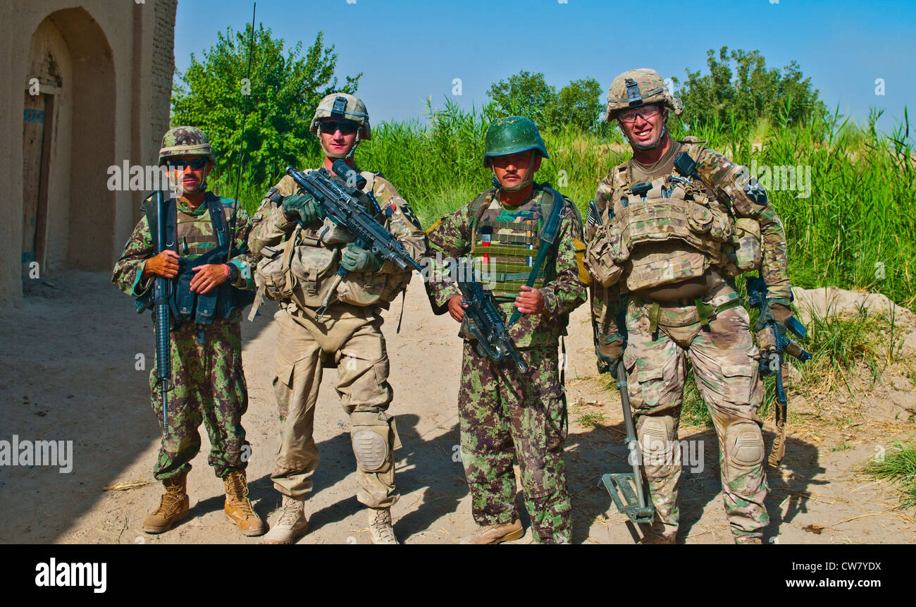 (From the right) Staff Sgt. Kelly Rogne and Spc. Krill Smyslov ...