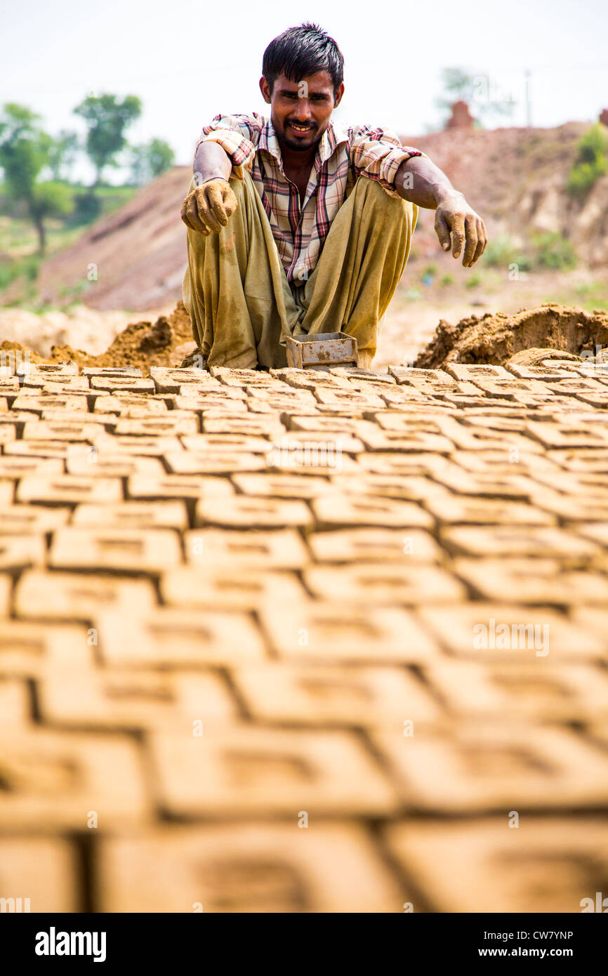 Making bricks at a brick works in Punjab Province, Pakistan Stock Photo ...