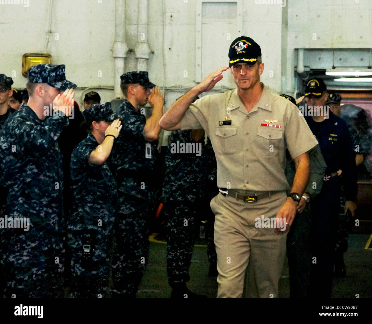 Capt. David Lausman, commanding officer of the aircraft carrier USS ...