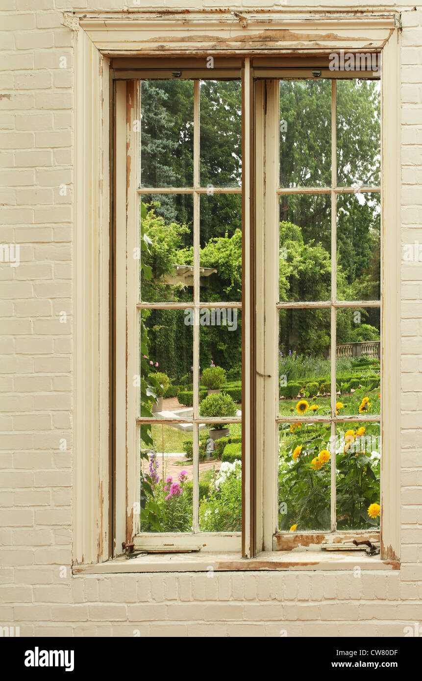 Garden Window. Formal Garden View Stock Photo - Alamy
