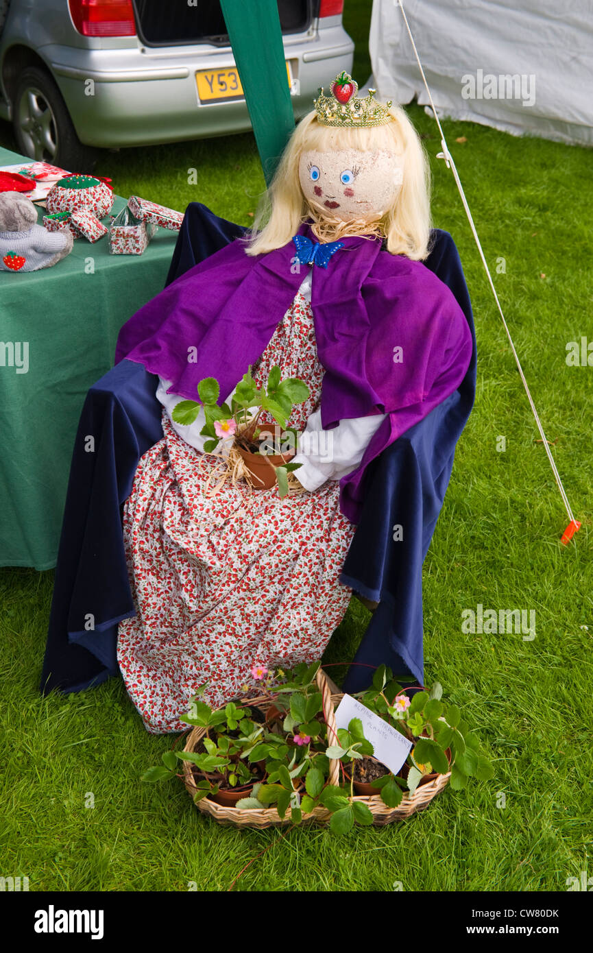 Effigy of The Queen at village fete on Scarecrow Day in village of ...