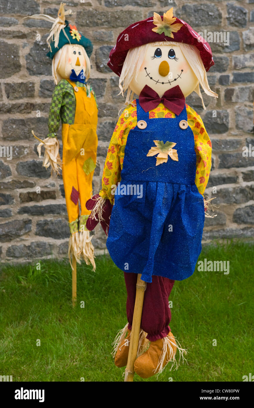 Scarecrows in garden at village fete on Scarecrow Day in village of ...