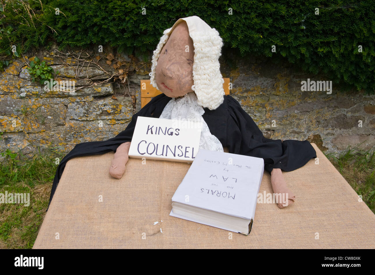Effigy of Judge at village fete on Scarecrow Day in village of Brampton ...