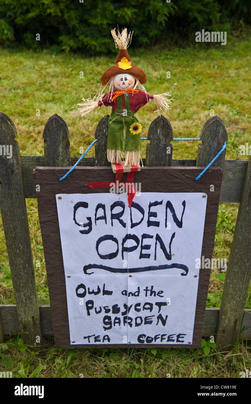 Minature Scarecrow in garden at village fete on Scarecrow Day in ...