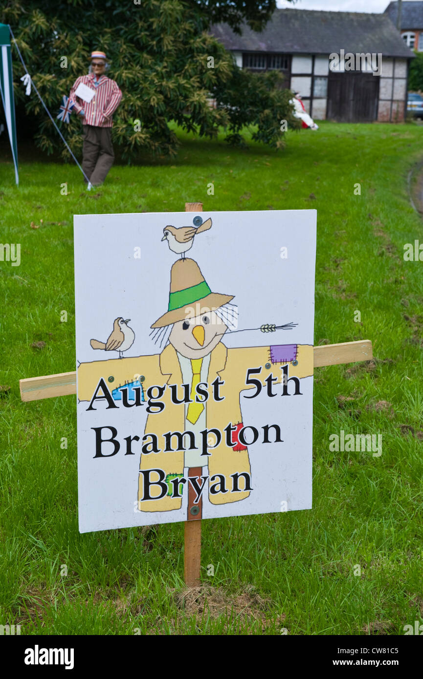 Roadside sign for Scarecrow Day at village fete in village of Brampton ...