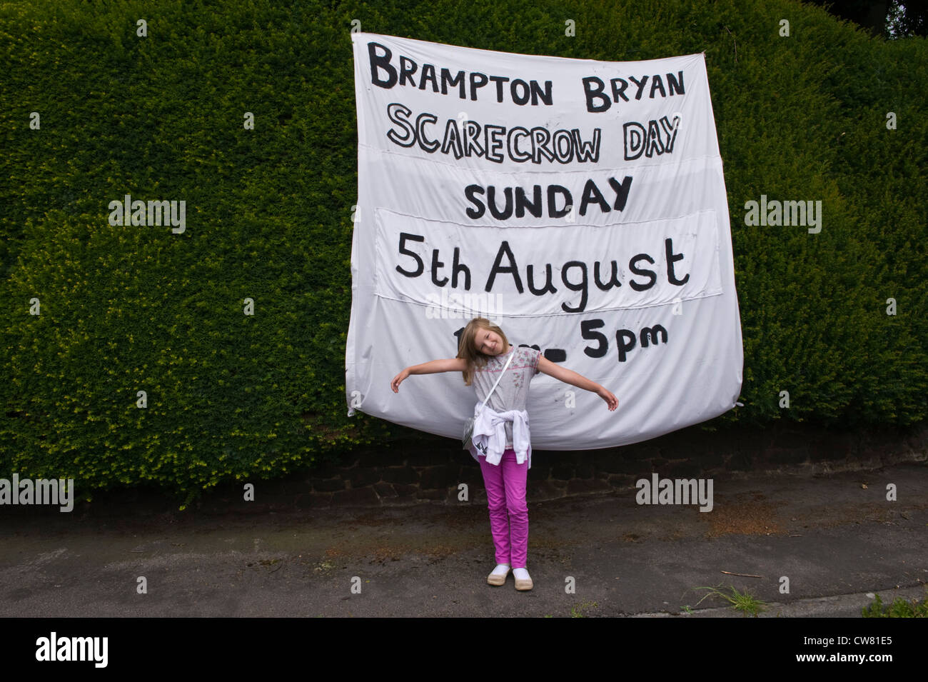 Roadside sign for Scarecrow Day at village fete in village of Brampton ...