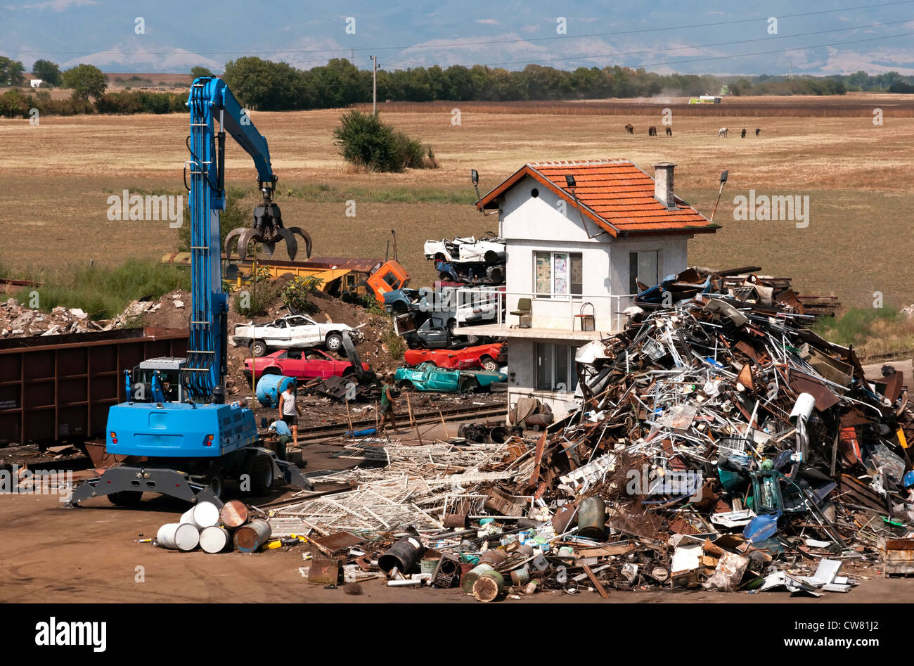 Iron scrap metal compacted to recycle Stock Photo - Alamy