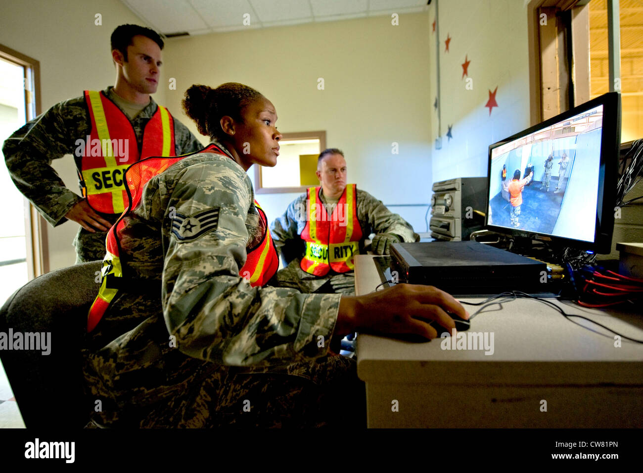 Staff Sgts. Ryan Michaels, Courtney Brock and Luke Frazier, 99th Security Forces Squadron ...
