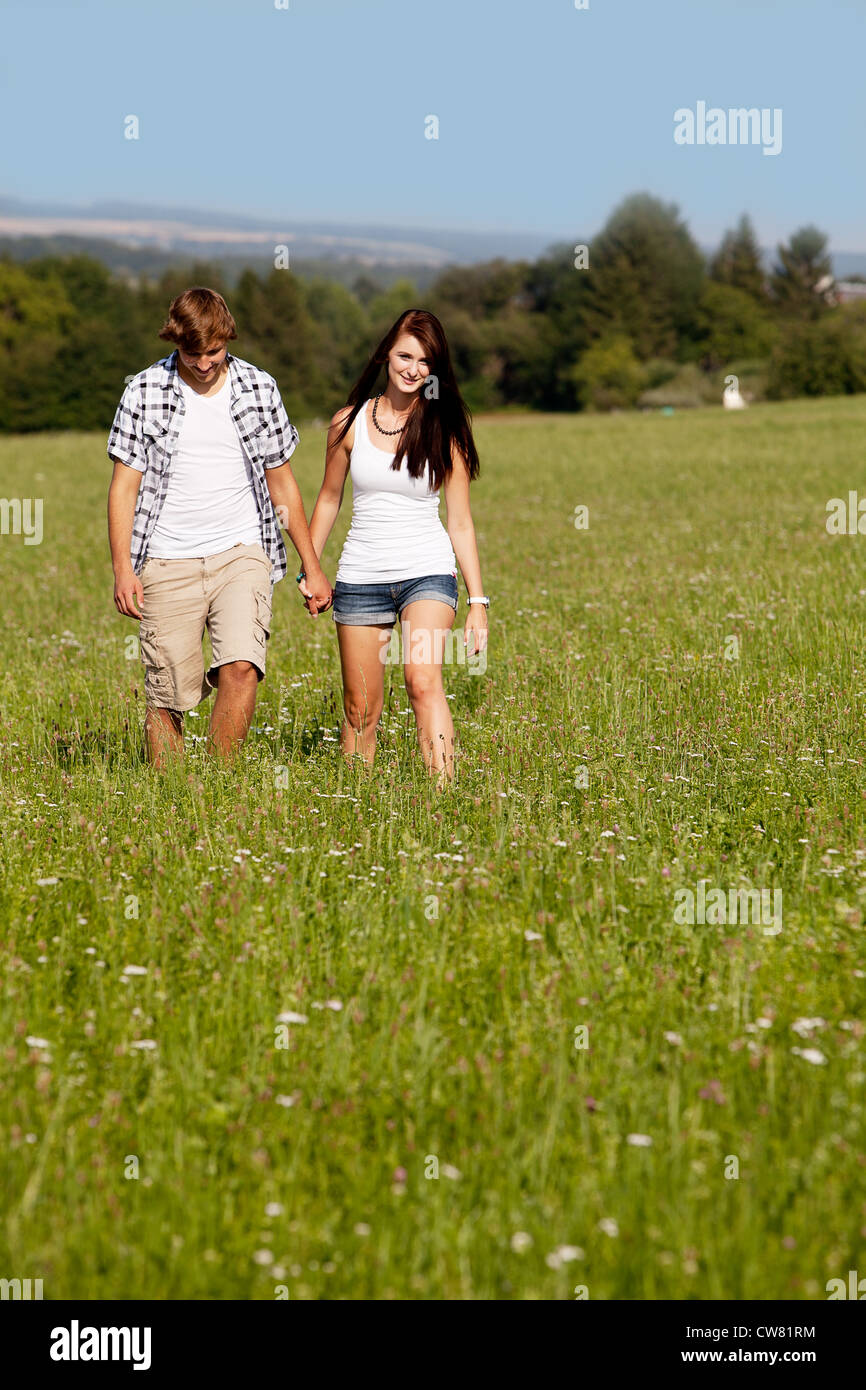 young love couple smiling outdoor in summer having fun Stock Photo - Alamy