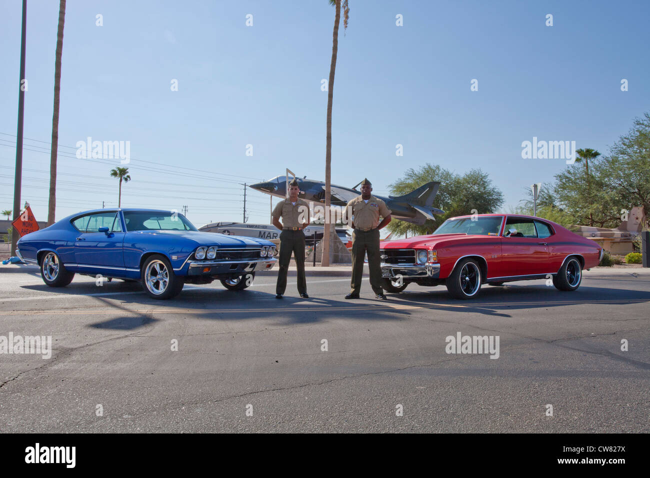 Capt. Kyle Ugone, left, stands with his 1968 Chevrolet Chevelle, while ...