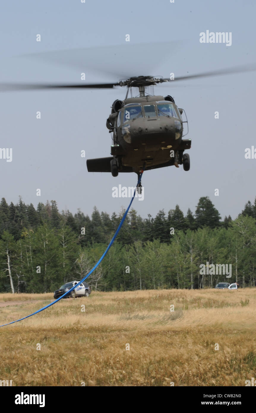 Colo using uh 60 helicopter equipped with hoist nets hi-res stock ...