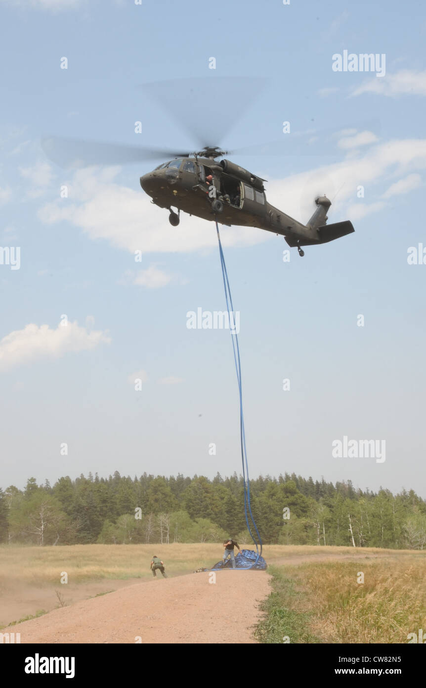2012 using uh 60 helicopter equipped with hoist nets hi-res stock ...