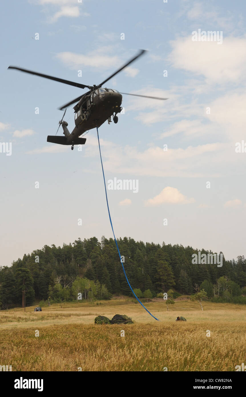 Colo using uh 60 helicopter equipped with hoist nets hi-res stock ...