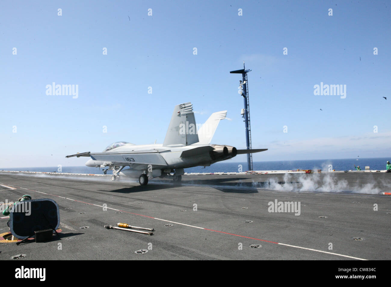 An F/A-18 Hornet is launched from a catapult aboard the USS Nimitz ...