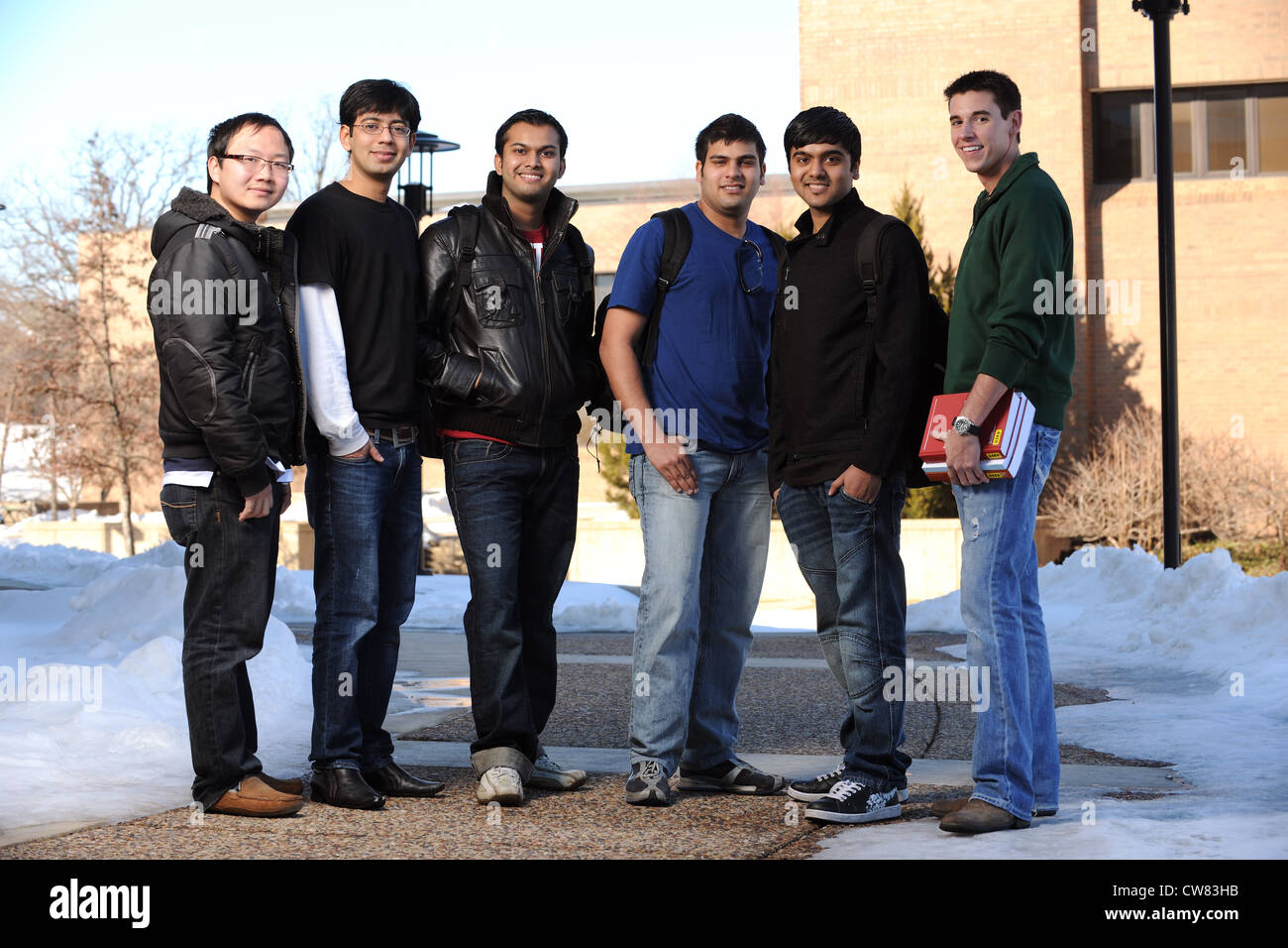 Diverse group of male college students in school campus Stock Photo - Alamy