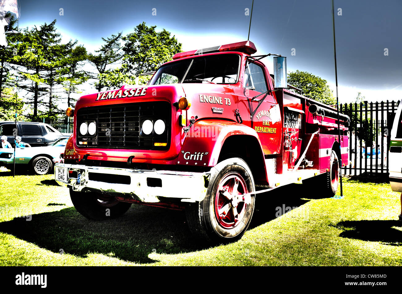 big red american firetruck with yemasse on the bonnet Stock Photo - Alamy