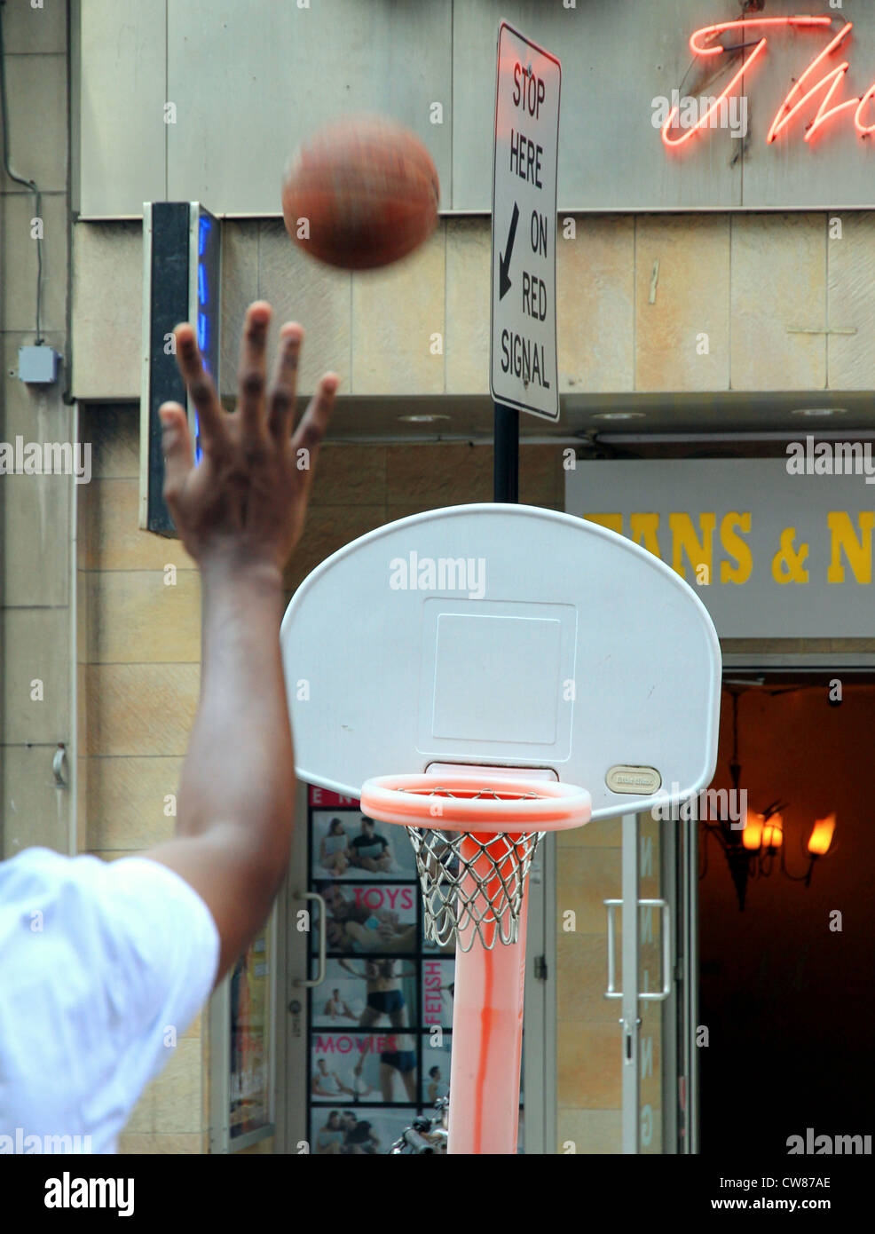 A man throwing a ball Stock Photo - Alamy