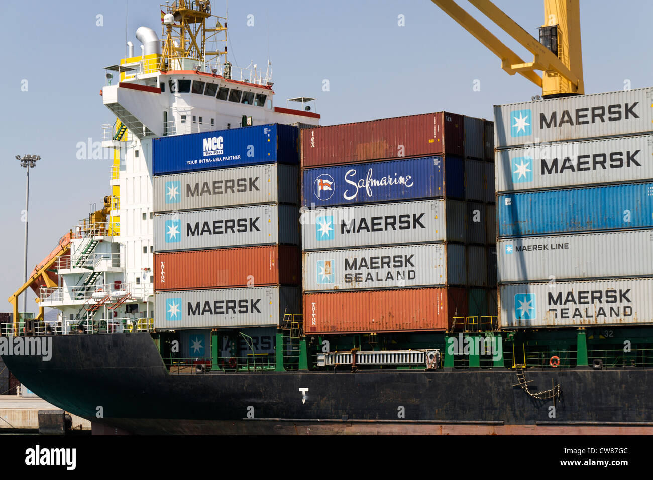 Containers being loaded in port hi-res stock photography and images - Alamy