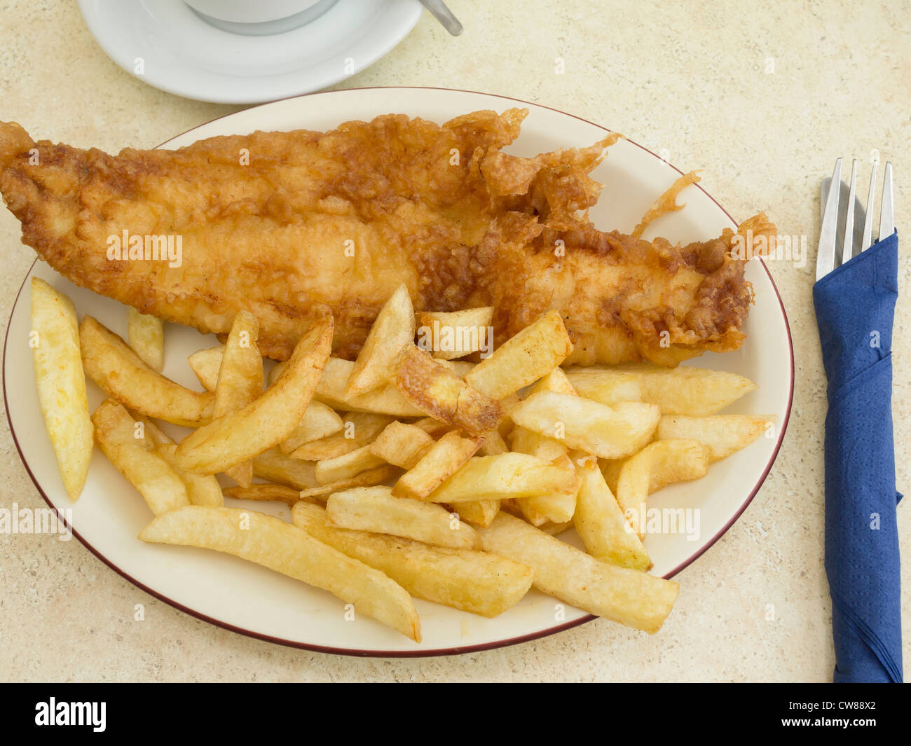 Regular portion of Fish and Chips with nice batter ready for eating in ...