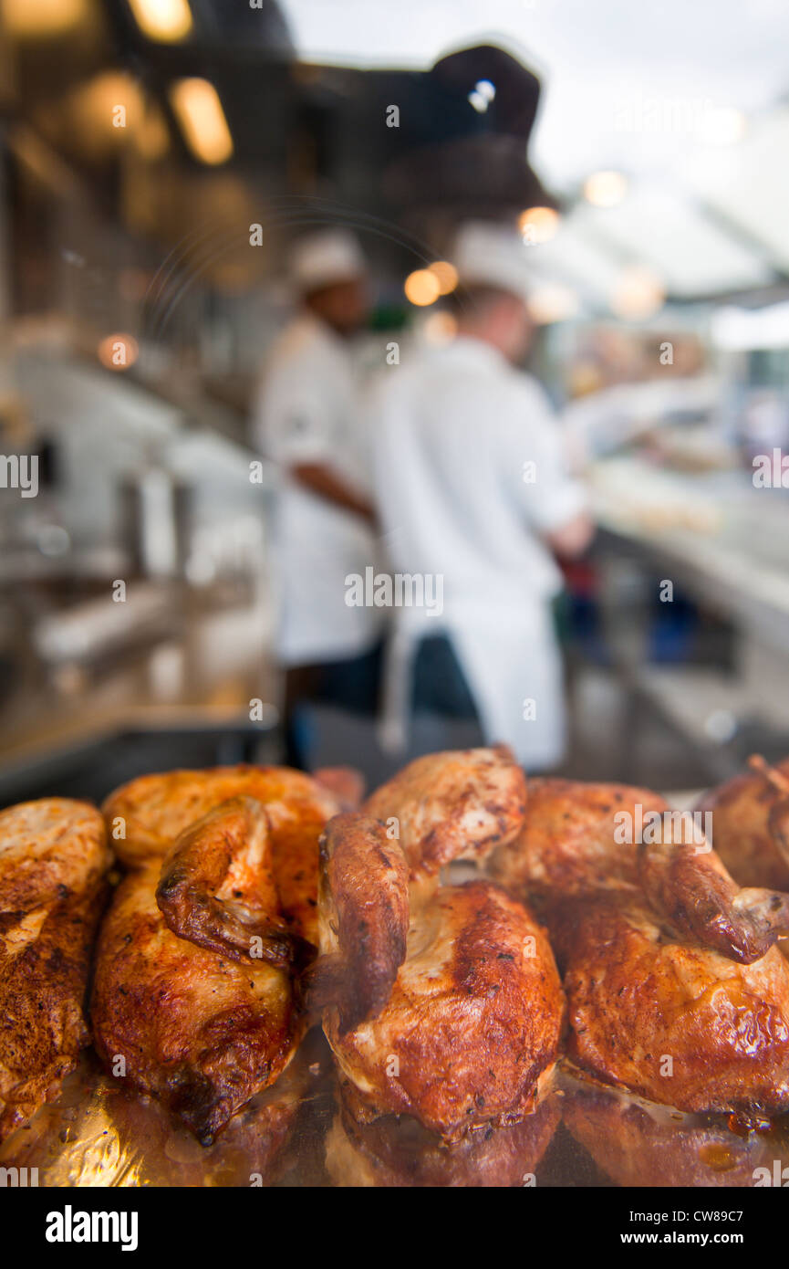 Zurich, Switzerland. Roast broiled chicken food in restaurant downtown ...