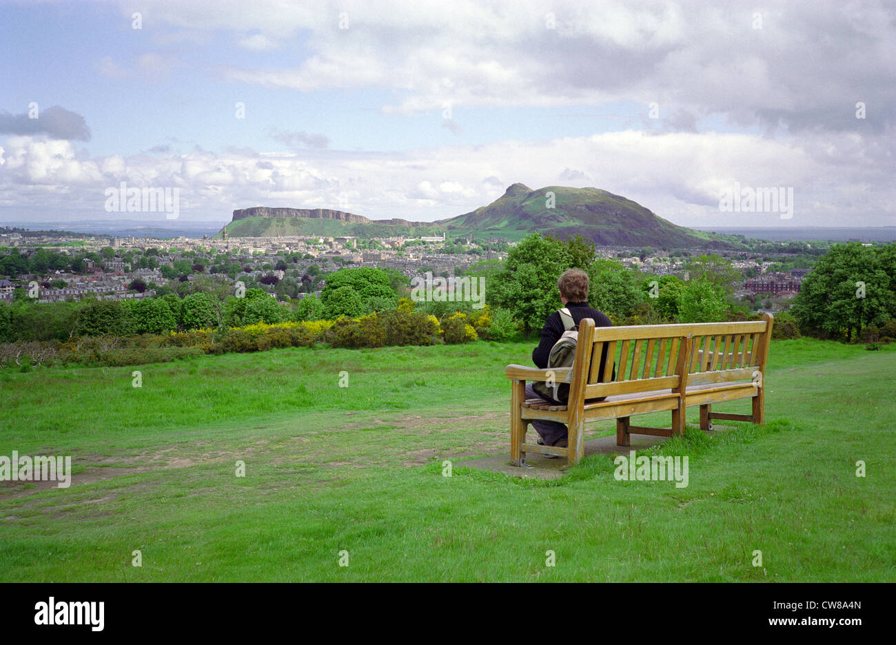 Caucasian Man Sitting on a Bench on Blackford Hill overlooking ...