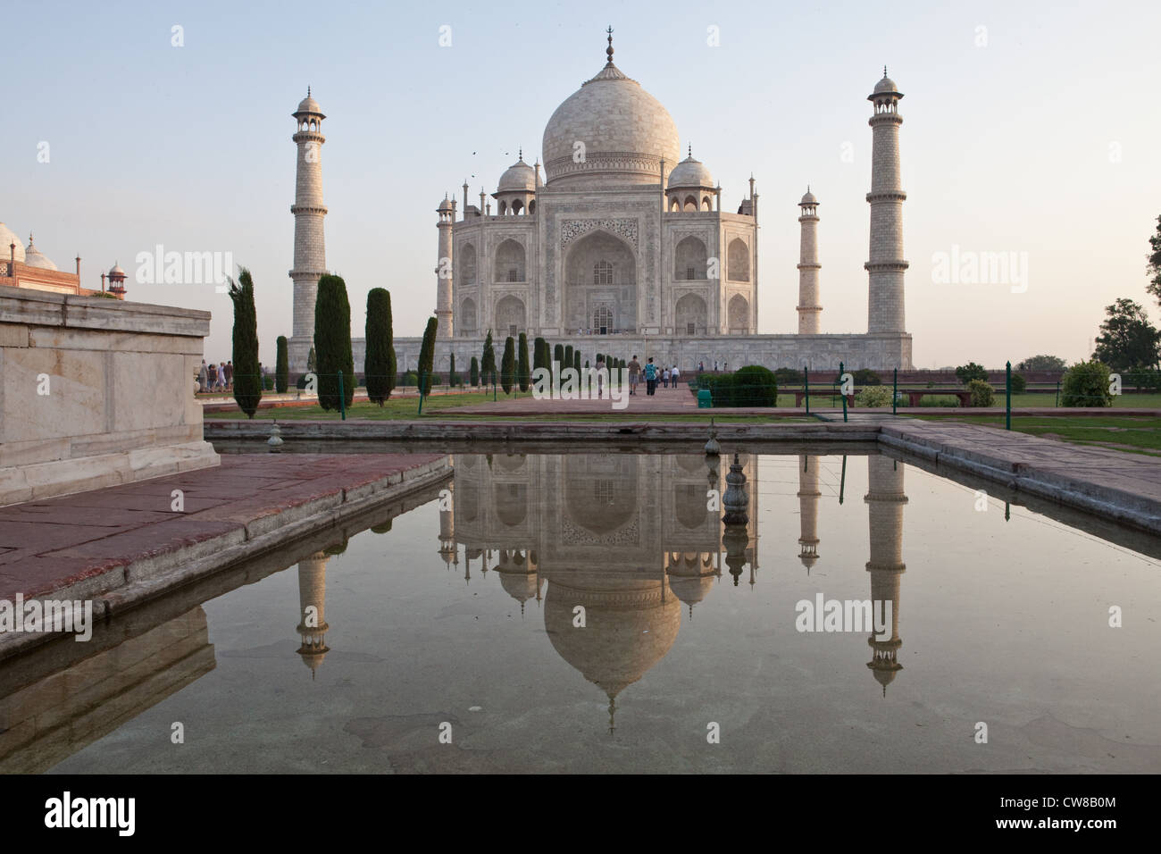 View of the Taj Mahal from the front with reflections in the water ...