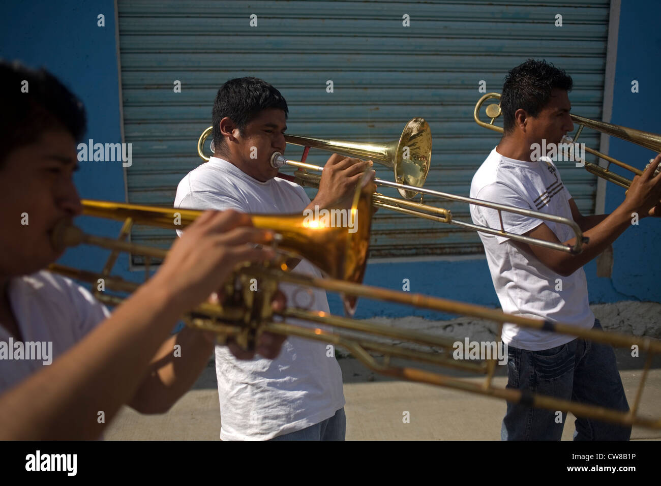 Trombonists of a music band perform during the celebrations in honor of ...