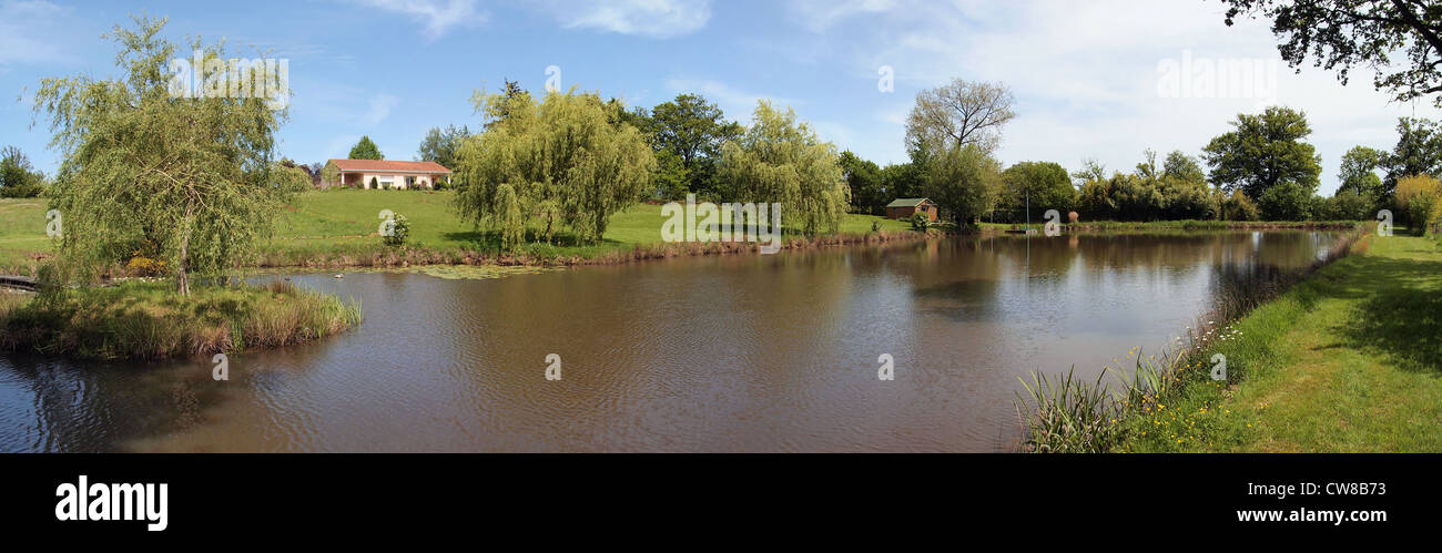 House at a pond hi-res stock photography and images - Alamy