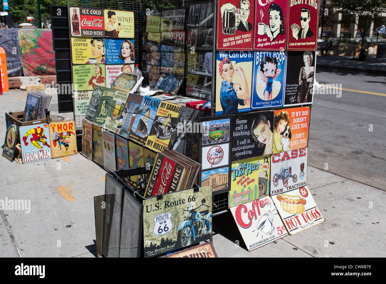 Street vendor display - old fashioned posters Stock Photo - Alamy