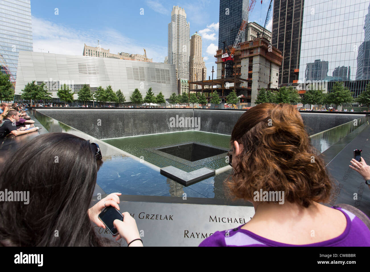 People gathered at South Pool Memorial, Ground Zero, World Trade Center ...