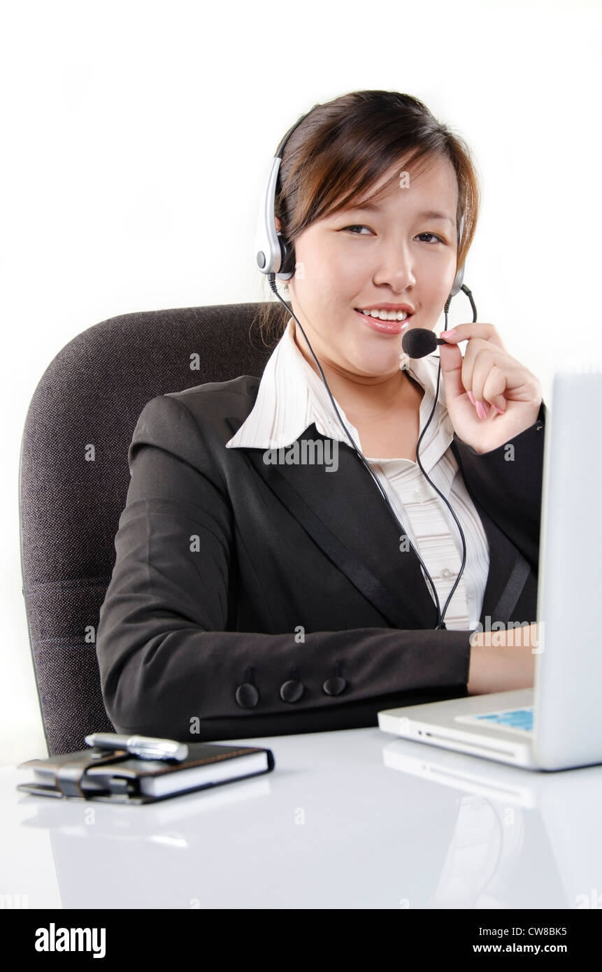 Smiling customer service agent Stock Photo - Alamy