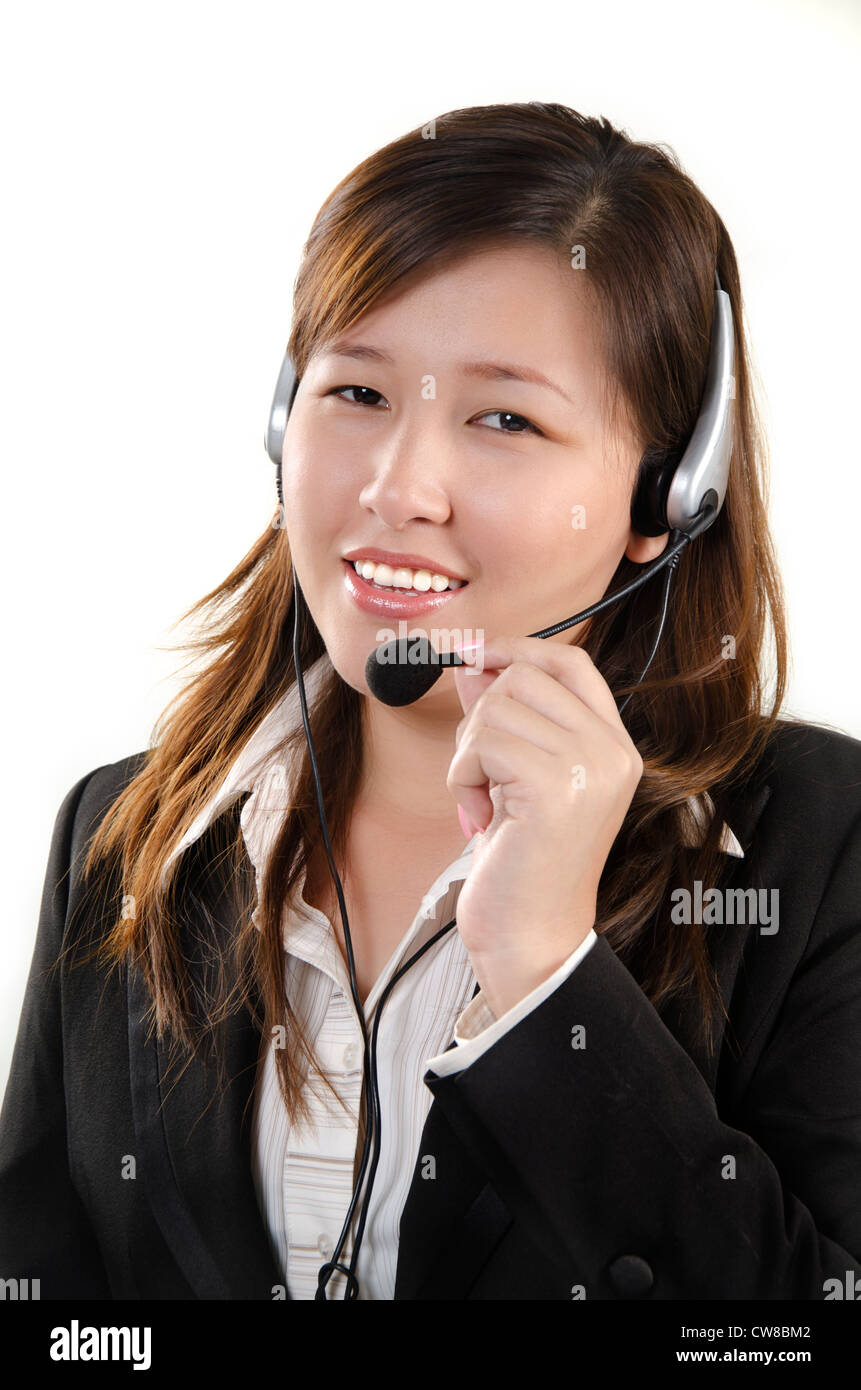 Young female service agent Stock Photo - Alamy