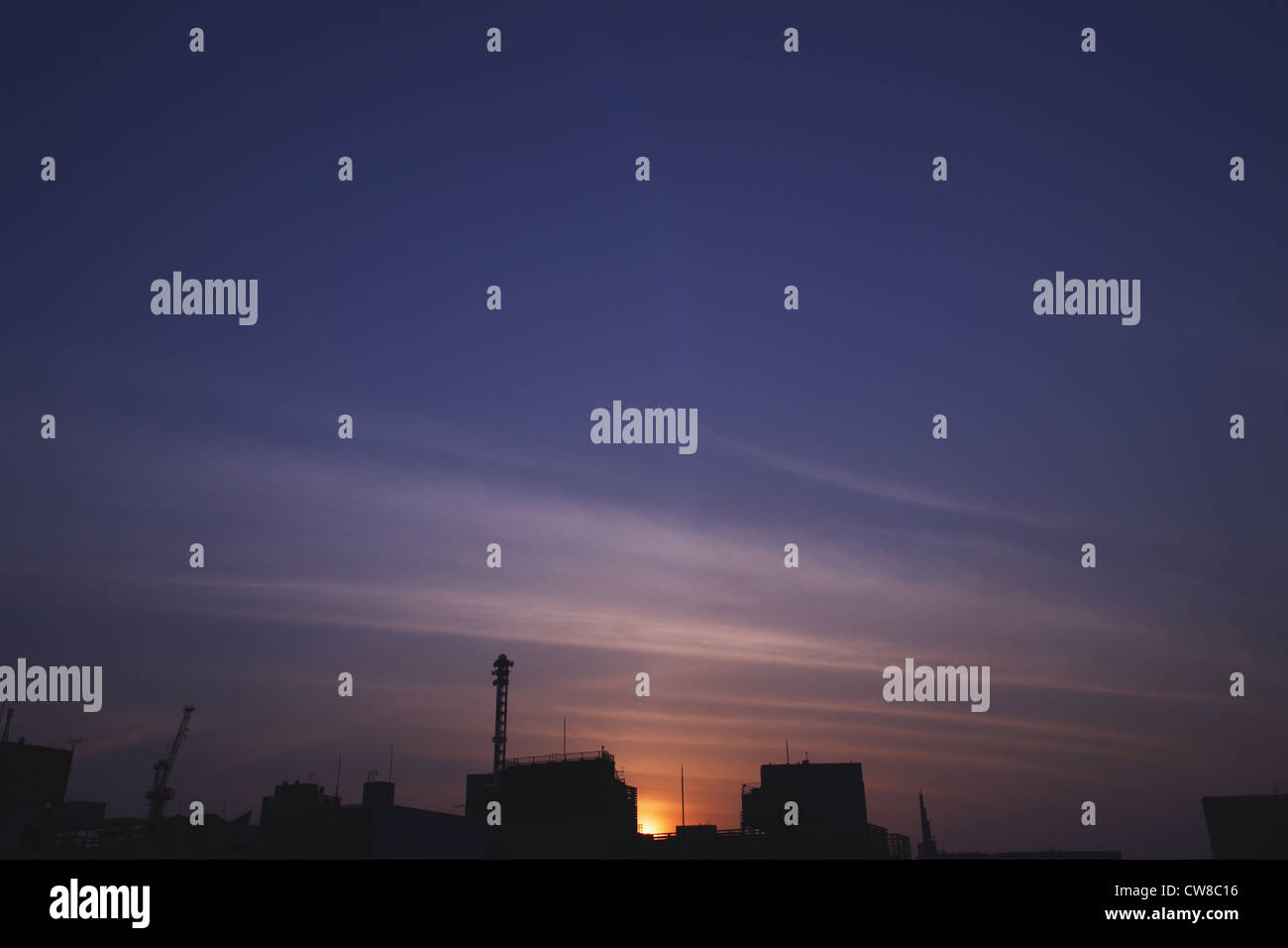 Sun Behind Building Stock Photo - Alamy