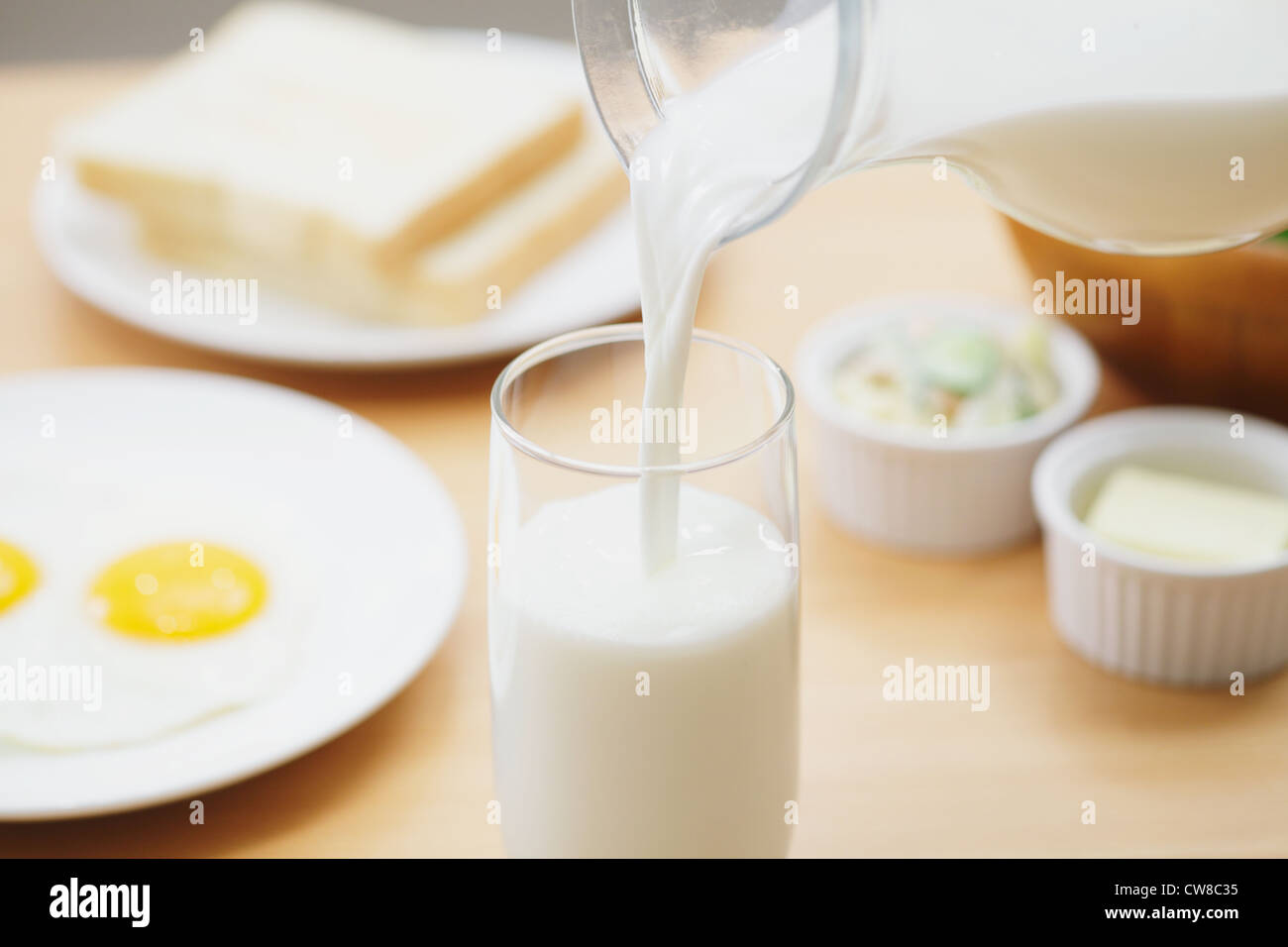 Milk At Breakfast Stock Photo - Alamy