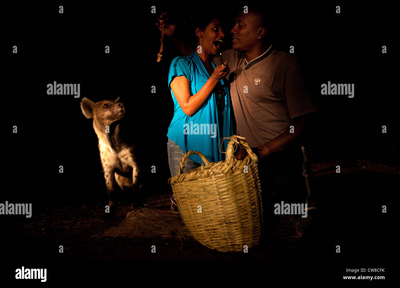 Hyena Man with tourist Harar Ethiopia Stock Photo - Alamy