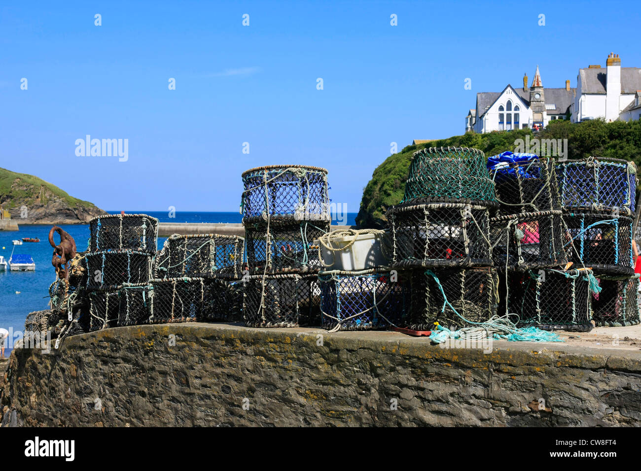 Lobster pots on the harbour wall at Port Isaac Cornwall Stock Photo - Alamy