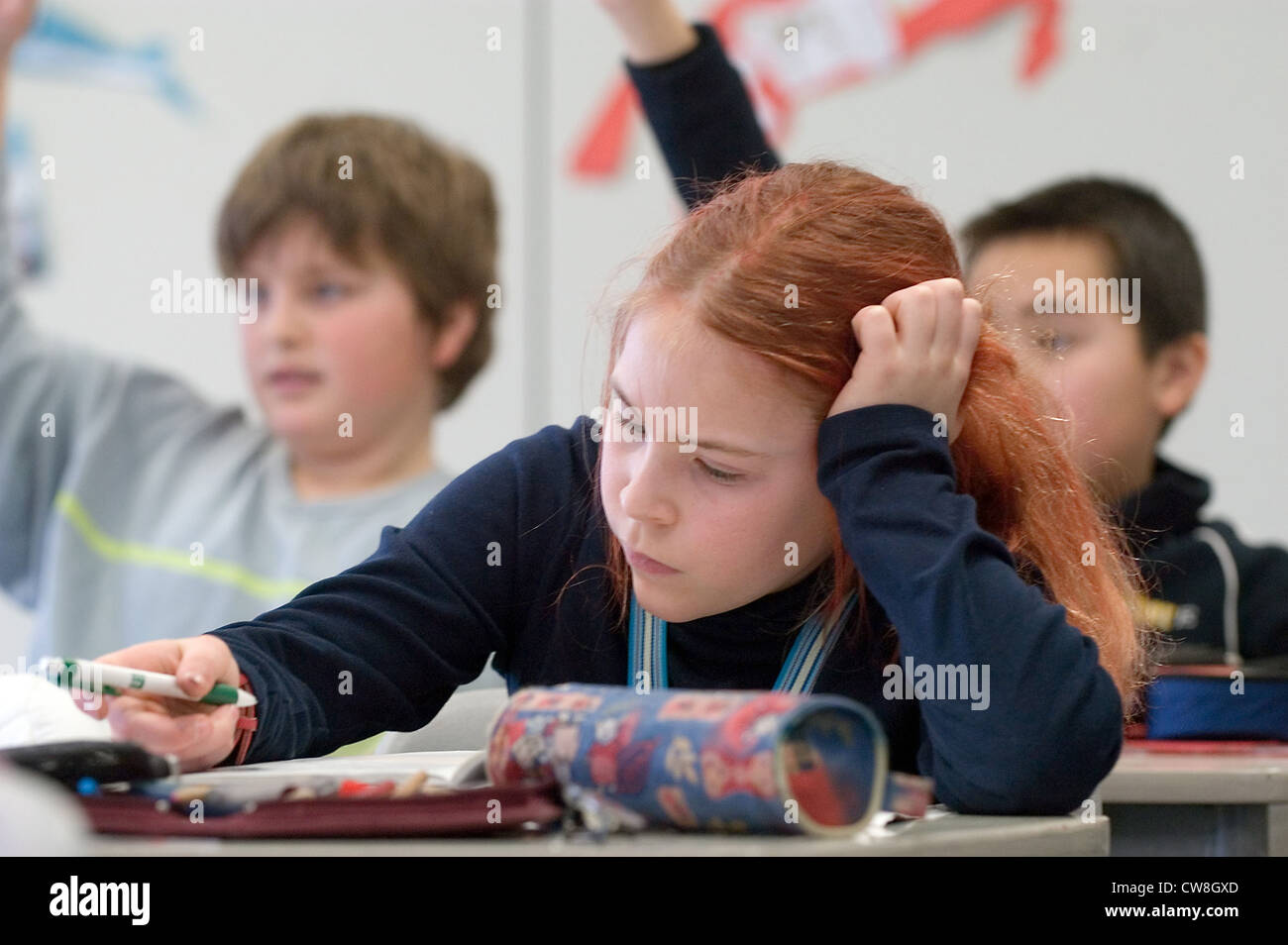 Boy distracted in classroom hi-res stock photography and images - Alamy