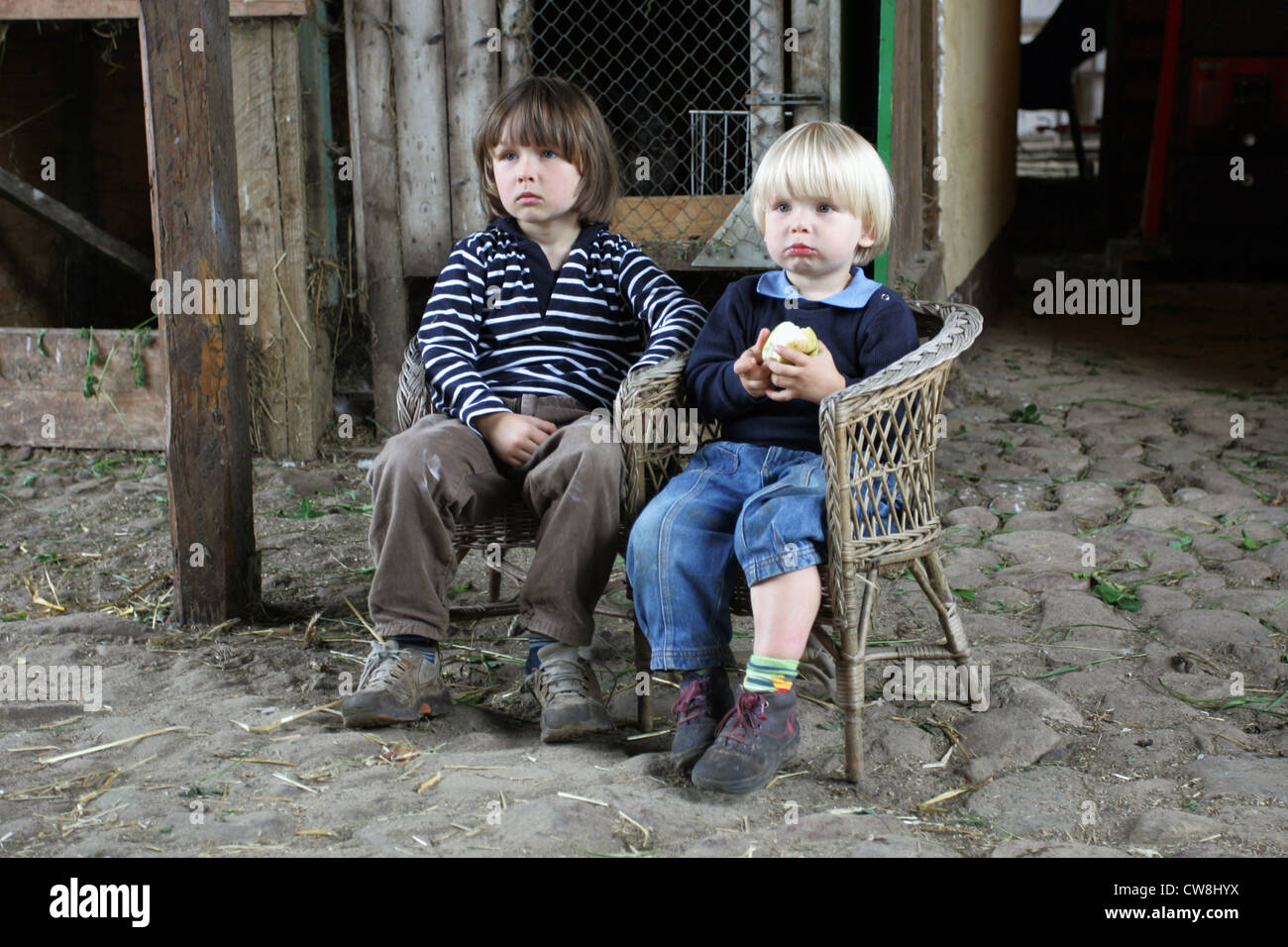 Boy girl sit chair fear hi-res stock photography and images - Alamy