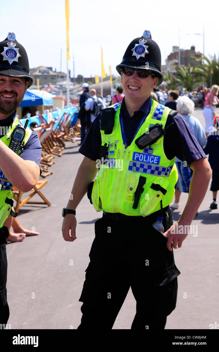 British Police patrol the seafront at Weymouth during the Summer season ...