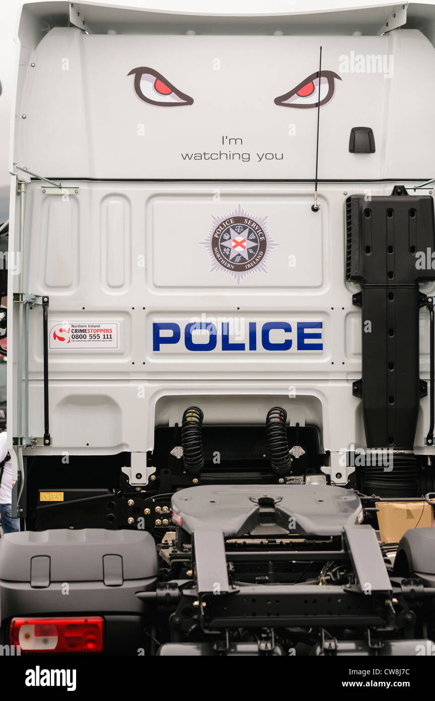 Rear of a police lorry/truck with a slogan "I'm watching you Stock ...
