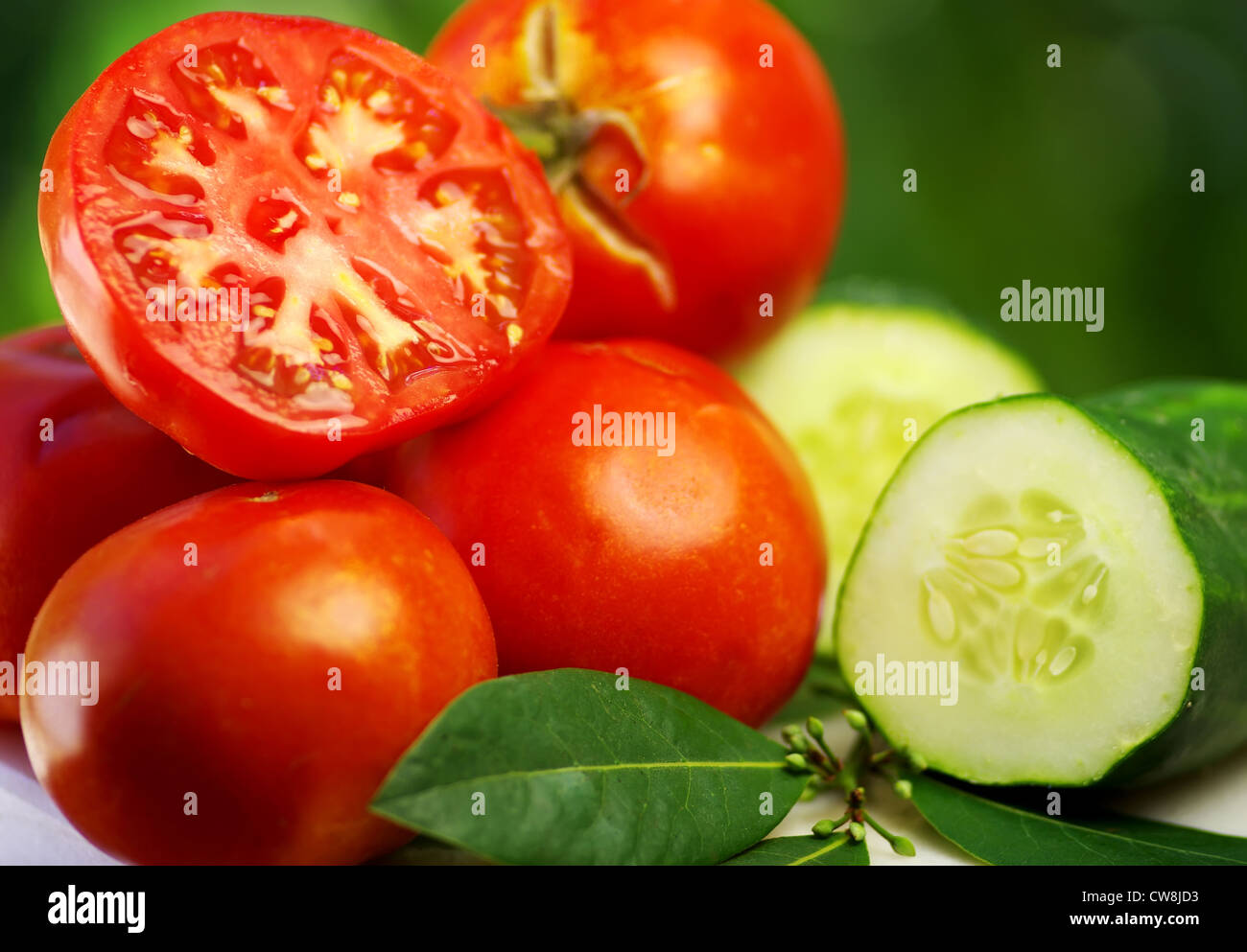 Cucumber and red tomato Stock Photo - Alamy