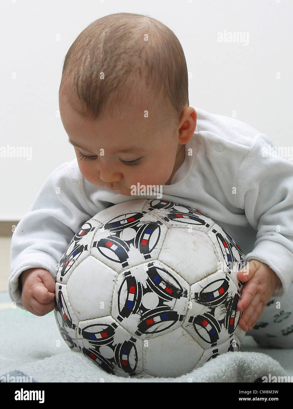 Baby with Soccer Stock Photo - Alamy