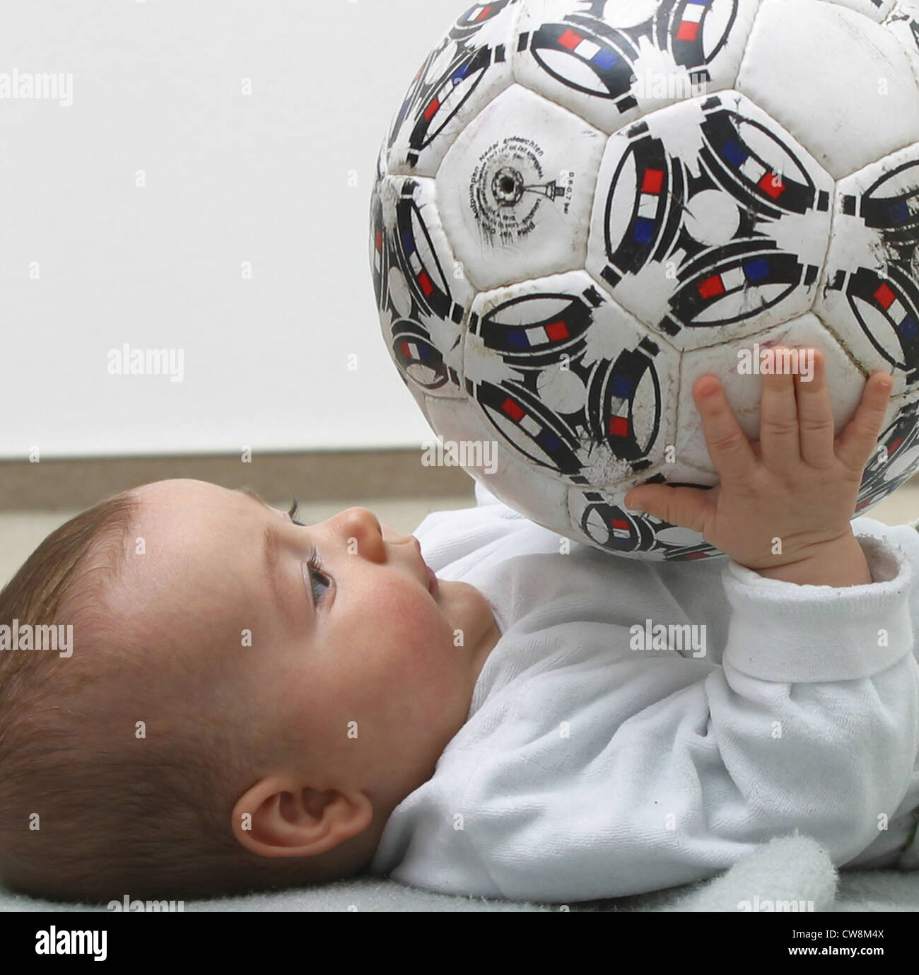 Baby with Soccer Stock Photo - Alamy